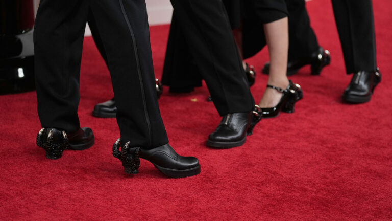 “Godzilla: Minus One” team steps onto the red carpet in clawed heels ...